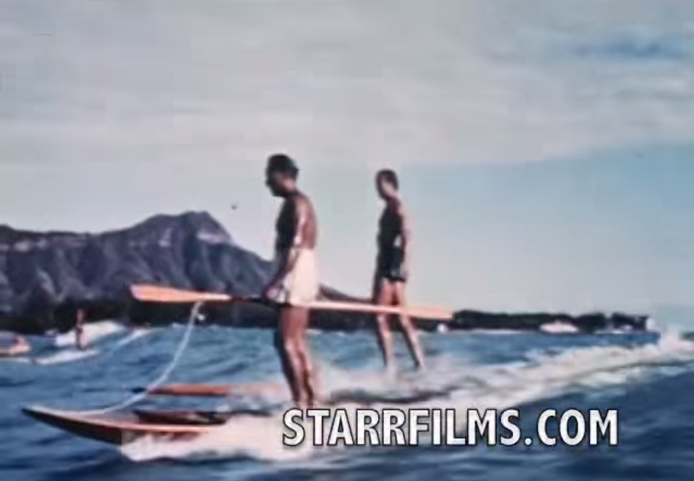 Duke Kahanamoku Sup Surfing in 1939
