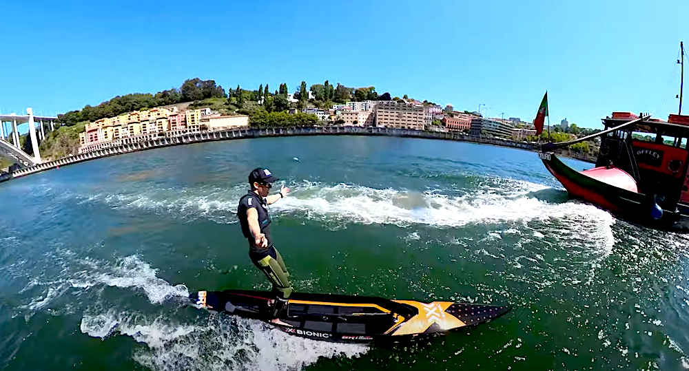 SUP Surfing the Wake of a River Boat - SUP World Mag